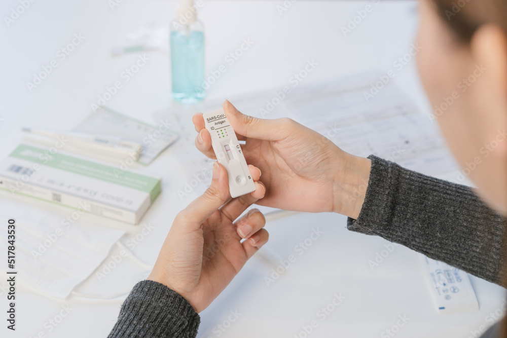 Pandemic of disease, asian young woman, girl hand show holding atk ...
