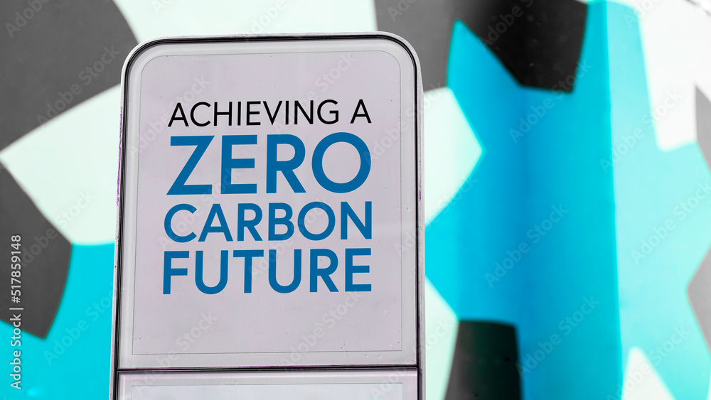Achieving a zero-carbon future on a colourful city backdrop location Stock Photo | Adobe Stock