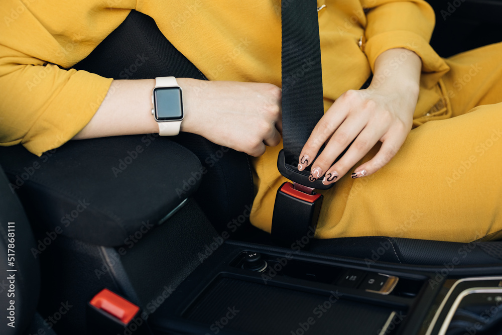 Buckle up seat belt in a car. Woman Hand Fastening Car Safety Seat Belt ...