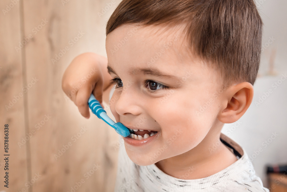 Child brushing teeth. Kids tooth brush and paste. Little funny baby boy ...