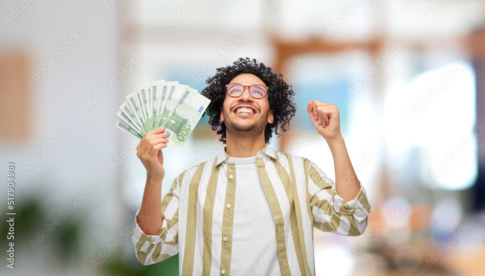 finance, currency and people concept - happy man holding hundreds of ...