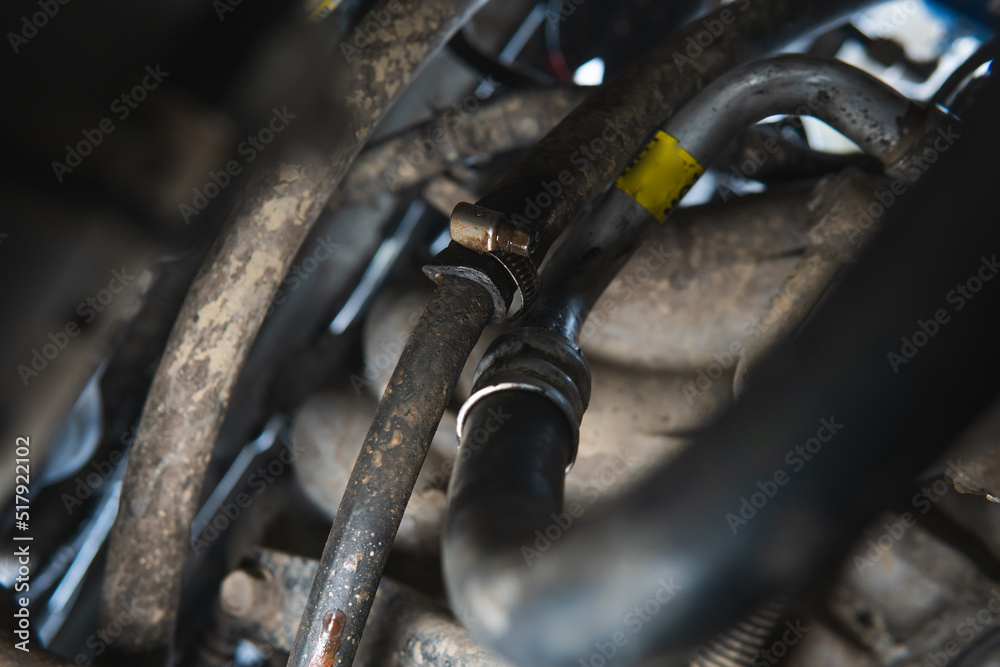 Oil, coolant and freon from the air conditioner, connections and clamps ...