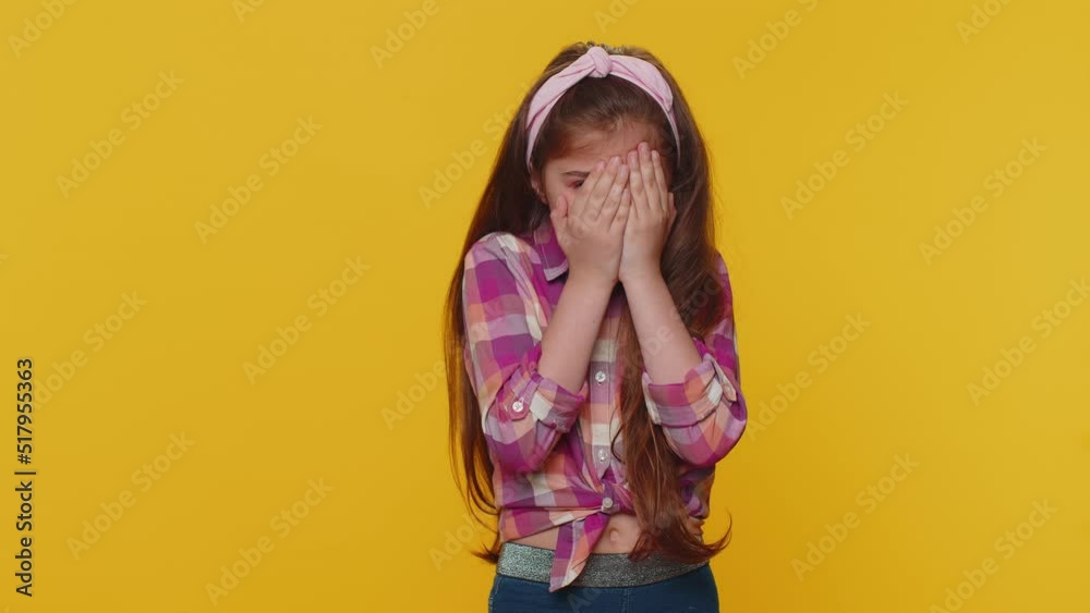Nosy curious young preteen child girl kid closing eyes with hand and ...