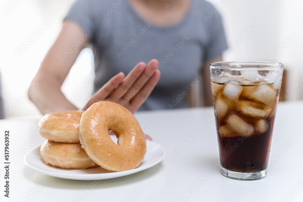 Dieting or good health concept. Young woman rejecting Junk food or ...