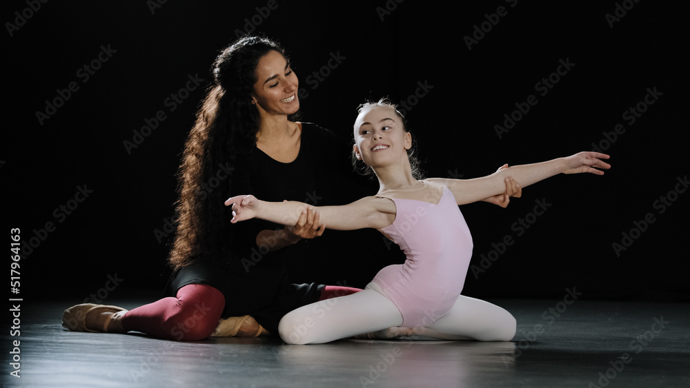 Hispanic woman coach dance trainer teacher with long curly hair help ...