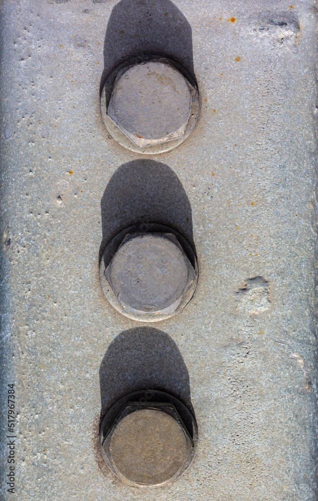 Foto de Large head bolts on metal construction as background ...