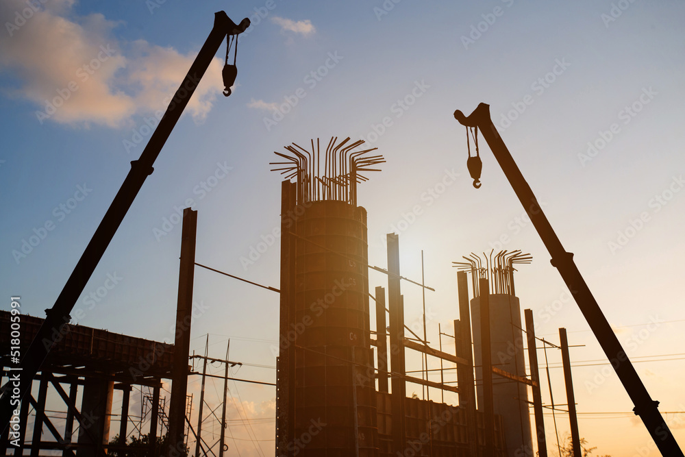 Crane is working on the construction of a columnar structure ...