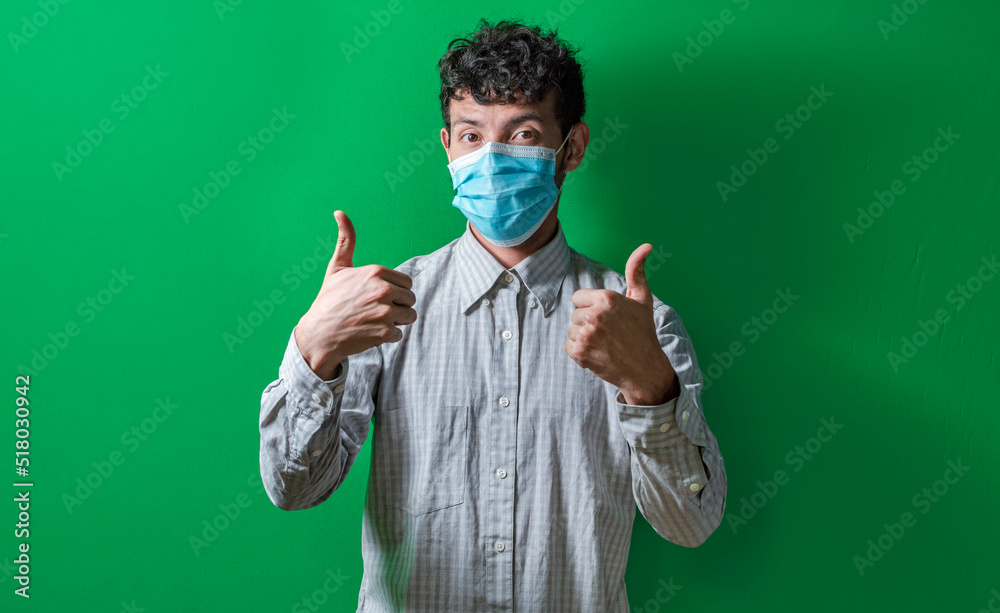 Isolated man with mask on giving thumbs up, Person giving thumbs up ...