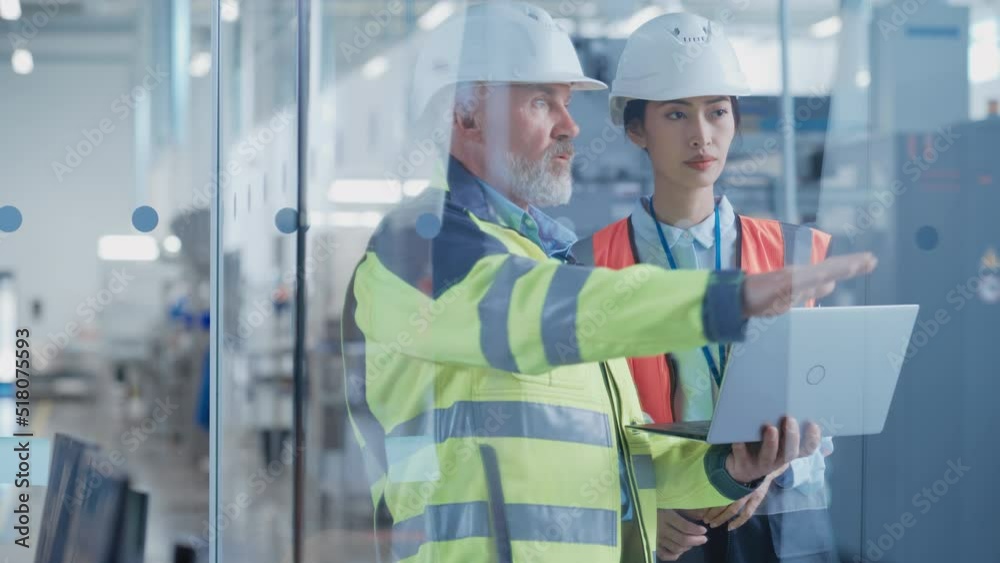 Asian Quality Control Specialist Conducting an Industrial Facility ...