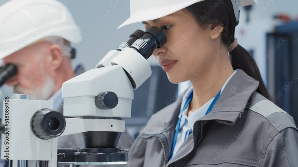 Close Up Portrait of a Young Asian Industrial Scientist Wearing a White ...