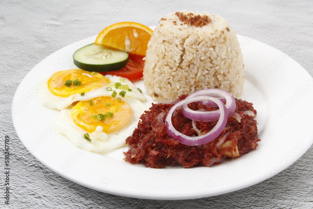 Freshly cooked Filipino food called Cornsilog or corned beef, egg and ...