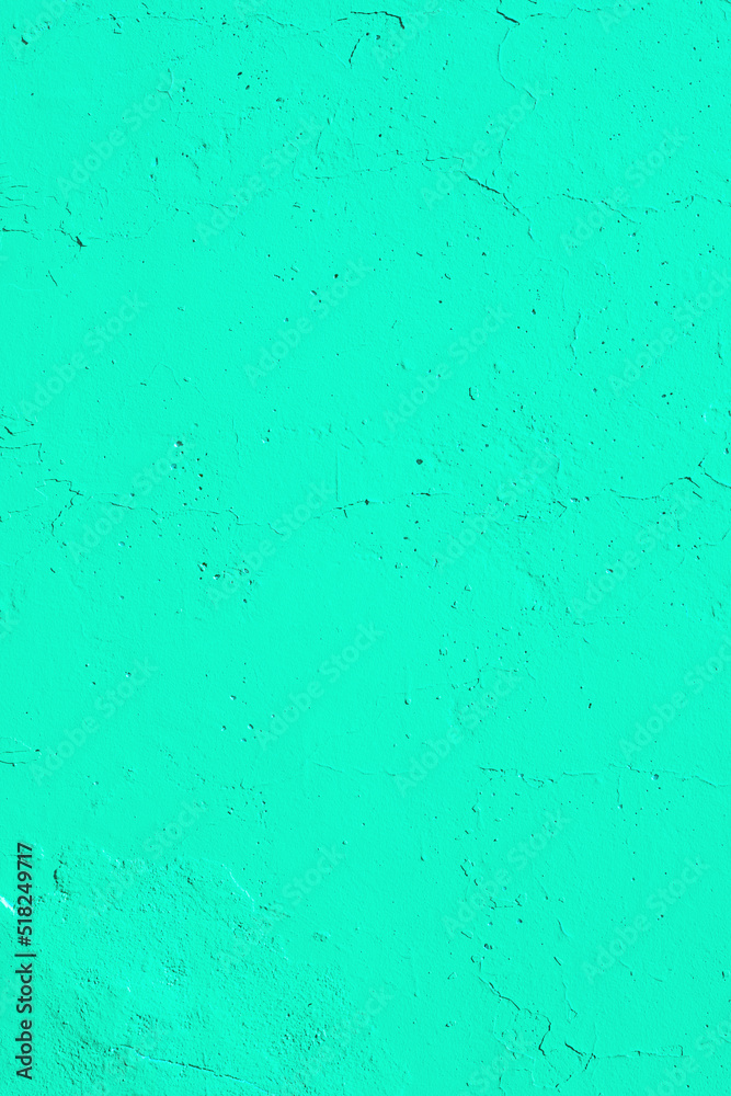 Closeup of saturated solid green mint urban wall concrete texture ...