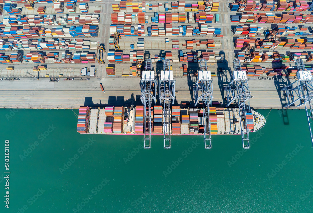 cargo ship and truck at seaport waiting for container dock crane ...