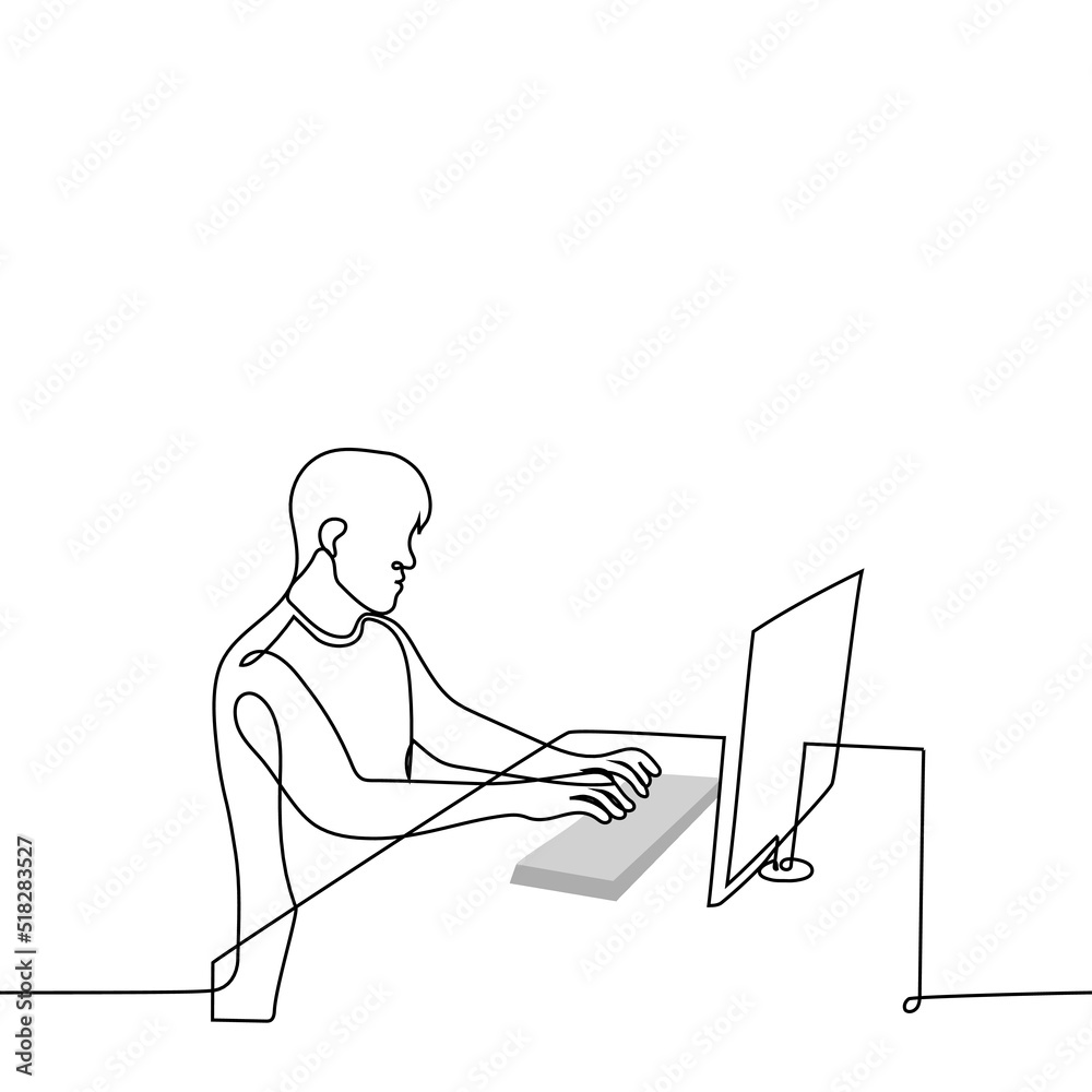 man is typing on the keyboard sitting at the table in front of the ...