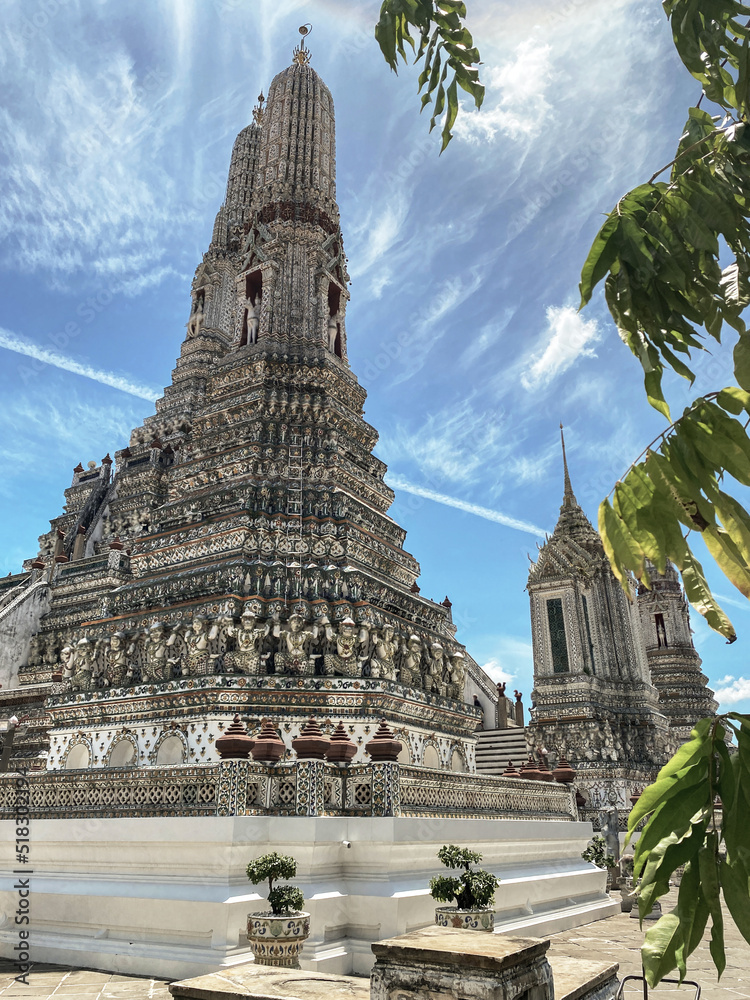 Wat Arun Temple in Bangkok, Thailand with stone pyramid towers, golden ...