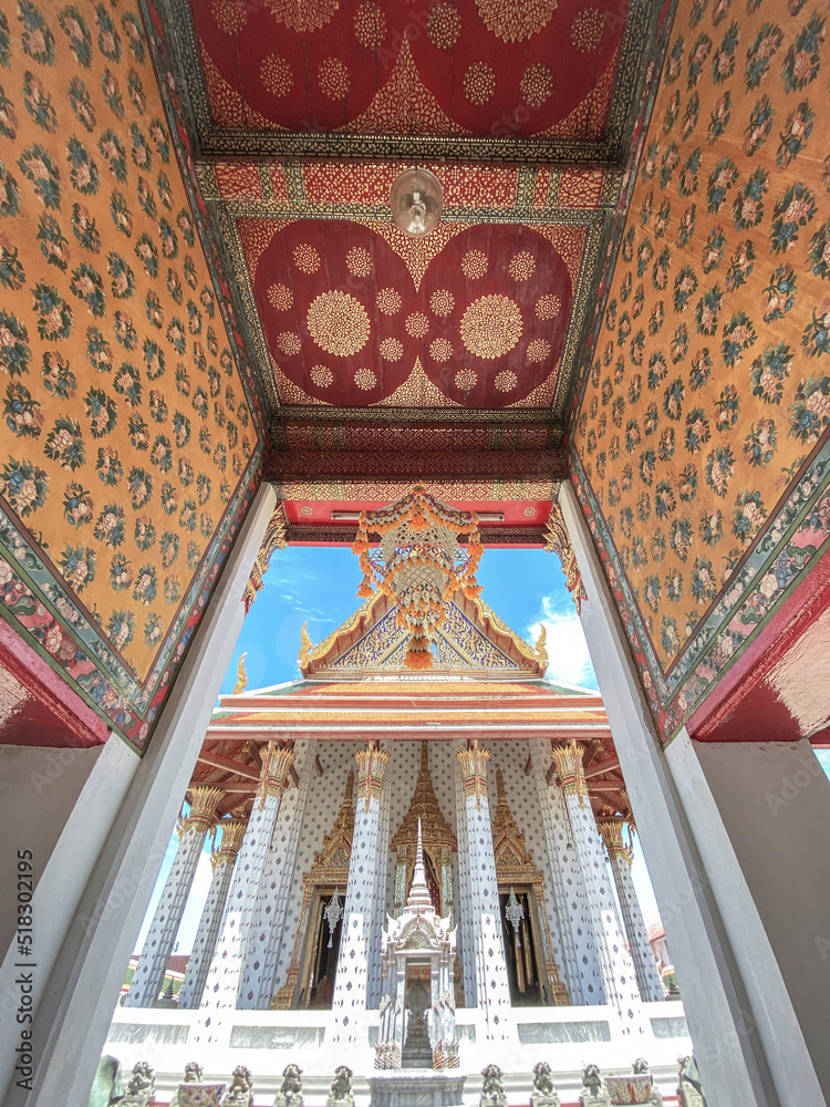 Wat Arun Temple in Bangkok, Thailand with stone pyramid towers, golden ...
