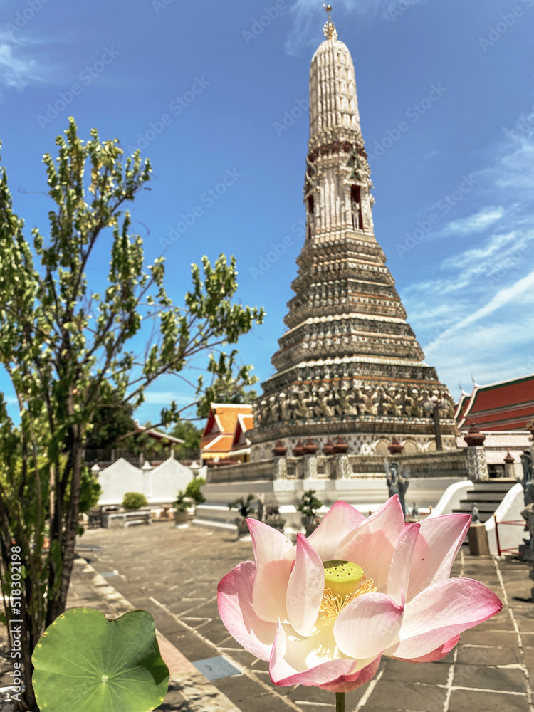 Wat Arun Temple in Bangkok, Thailand with stone pyramid towers, golden ...
