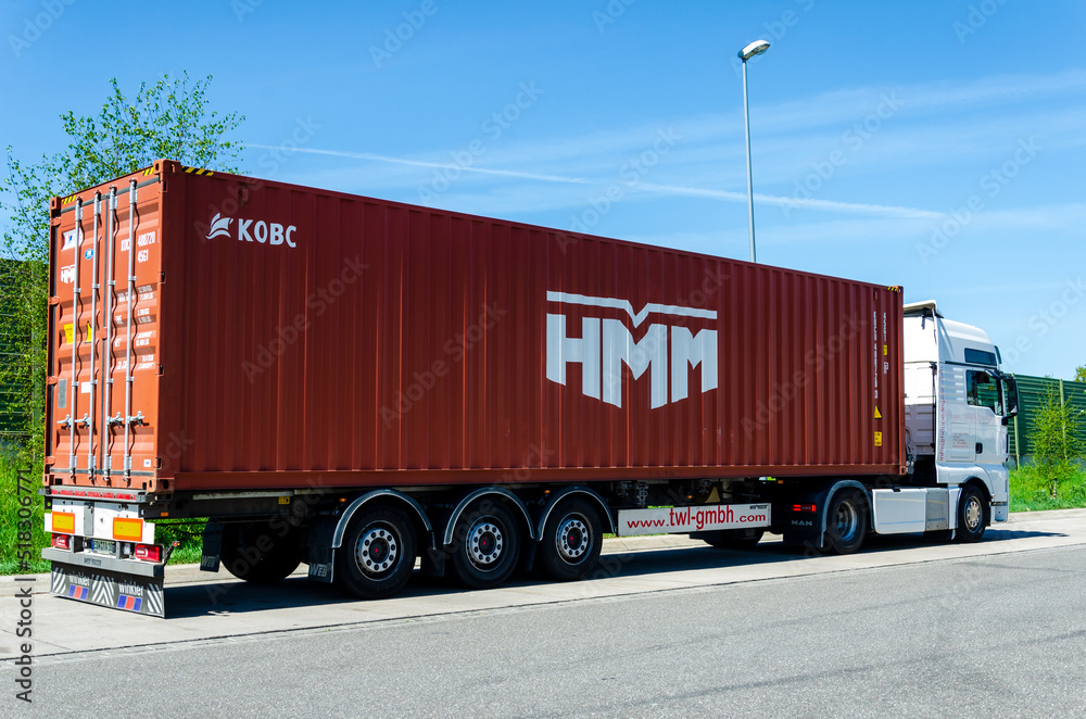 Seevetal, Germany - May 09, 2022: HMM cargo container transportation on truck. HMM Co., Ltd ...