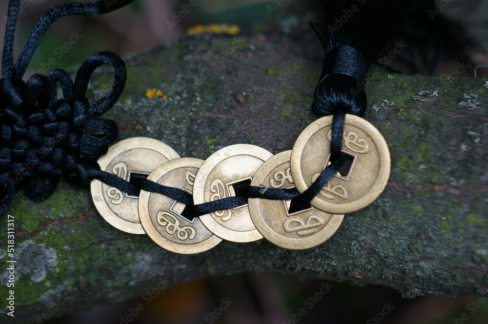 A bunch of Chinese coins in close-up. A symbol of prosperity and wealth ...