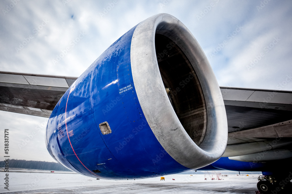 Airplane engine with aircraft wing on runway of airfield Stock Photo ...