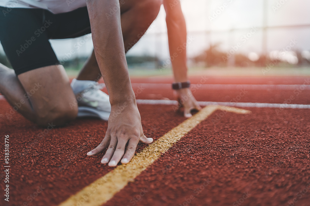 Hands runner ready start to run athlete sportman training run on lane ...