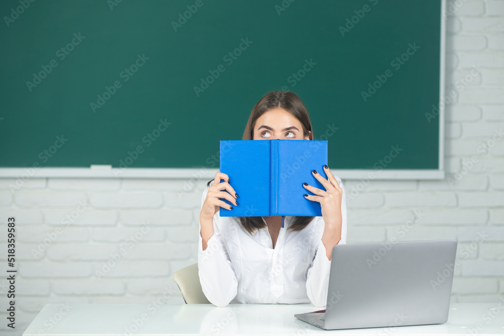 Portrait of a young, confident and attractive female student studying ...