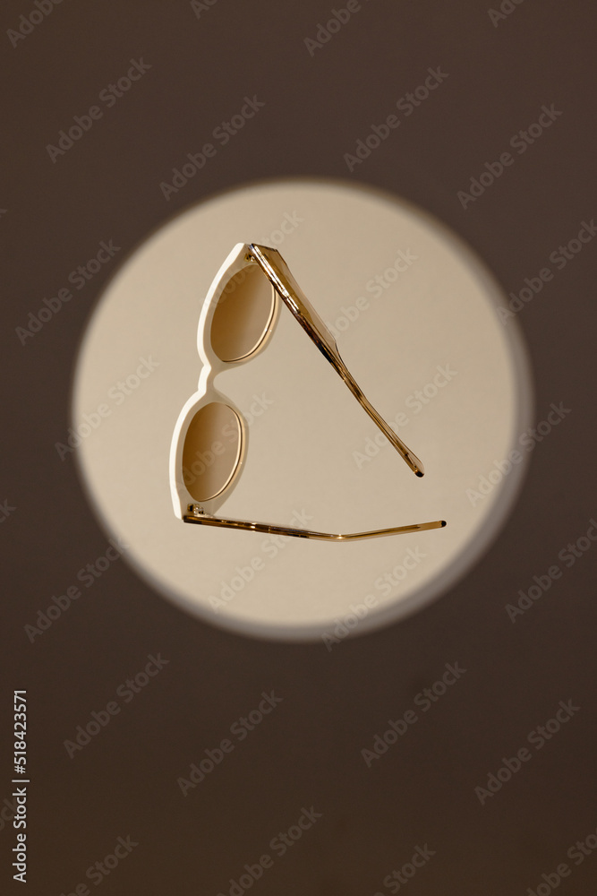 sunglasses floating in circular frame Stock Photo | Adobe Stock