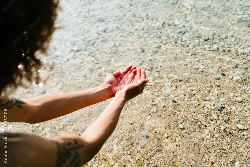 Human hands cupped to catch freshwater from the river Stock Photo ...