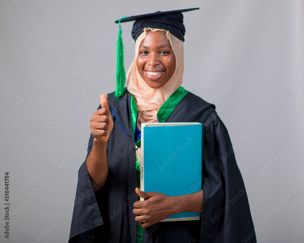 African Nigerian Muslim lady, student or graduand, wearing an hijab ...
