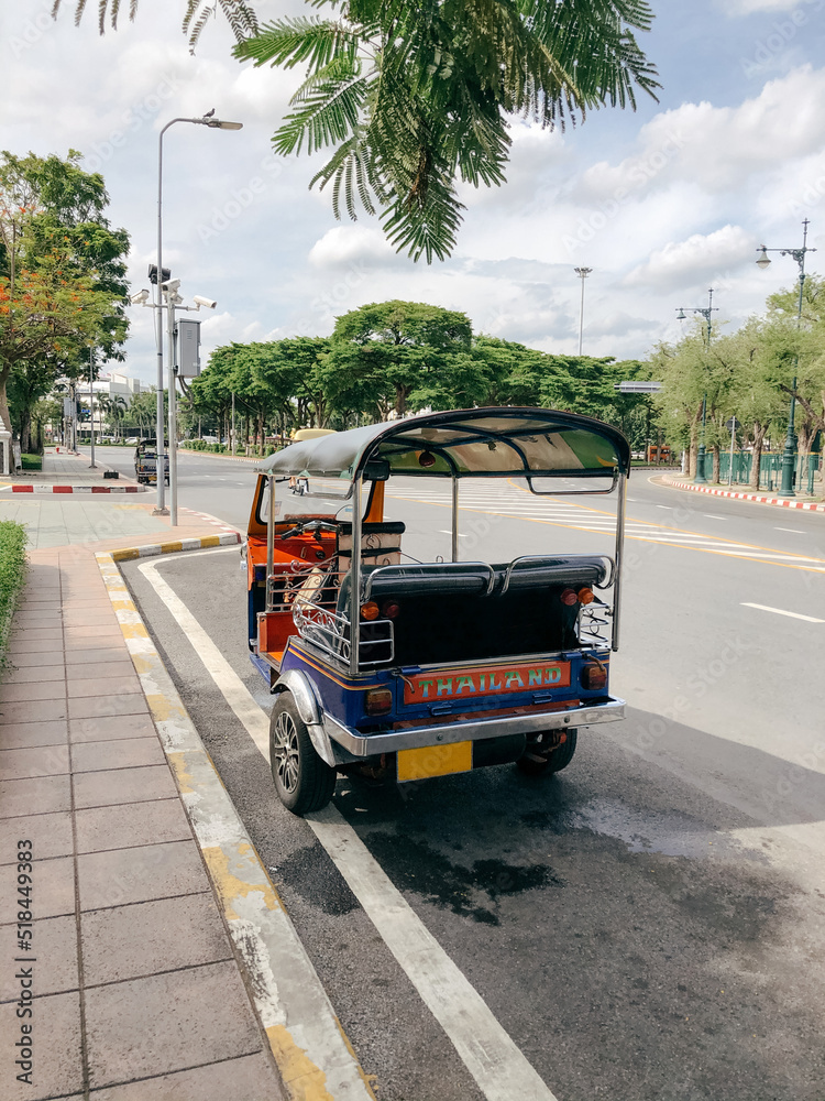 UGC, local Thai tuk tuk car. Stock Photo | Adobe Stock