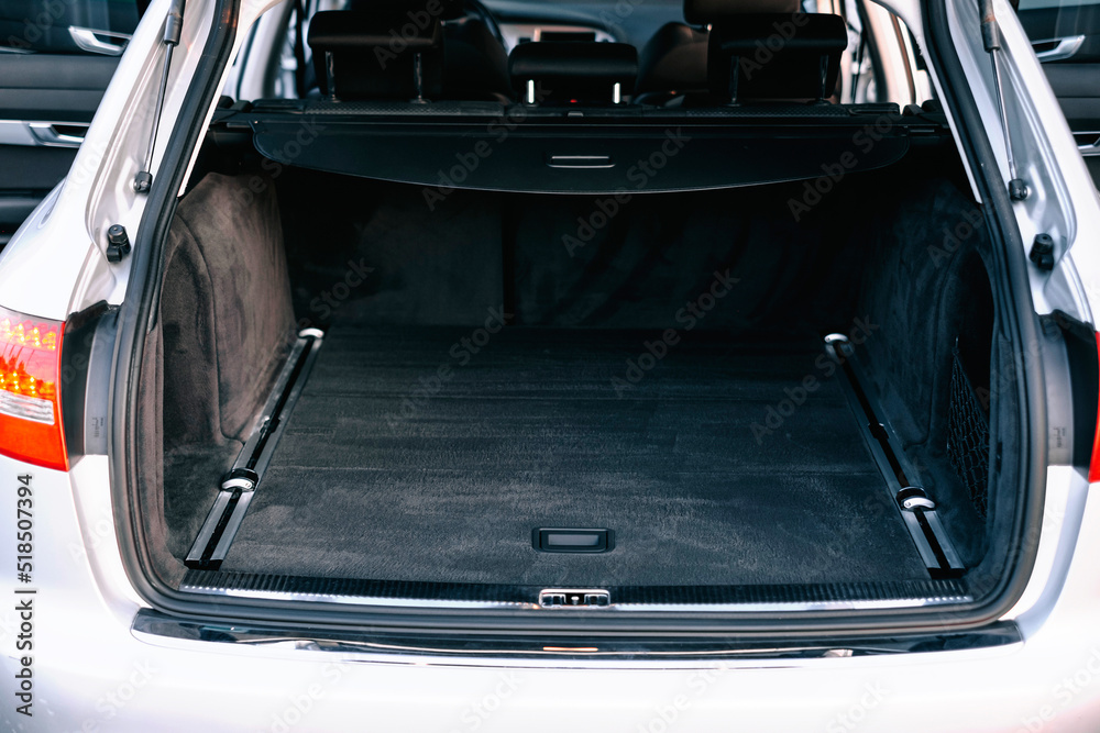 Car trunk. Open trunk. Seat of the second row of seats. Stock Photo ...