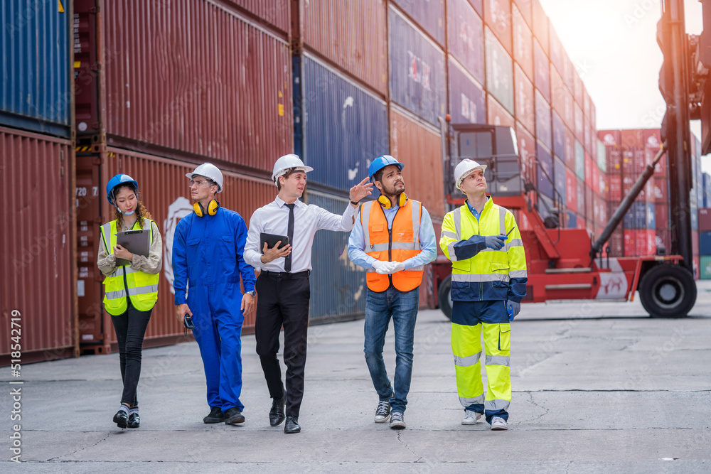 Engineer container cargo with worker working and checking stock into ...