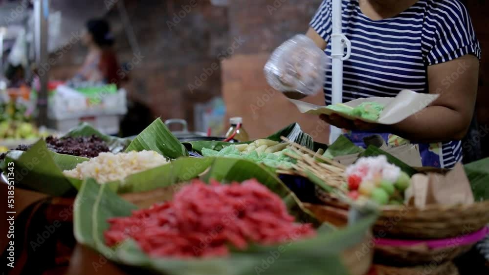 Traders in the market selling traditional snacks, Balinese Indonesian ...