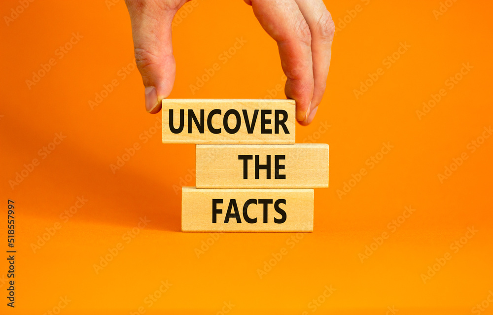 Uncover the facts symbol. Concept words Uncover the facts on wooden ...