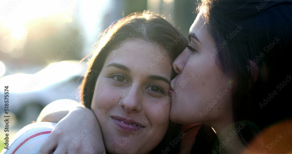 Pretty girl flipping the finger at camera, close-up young woman gives ...