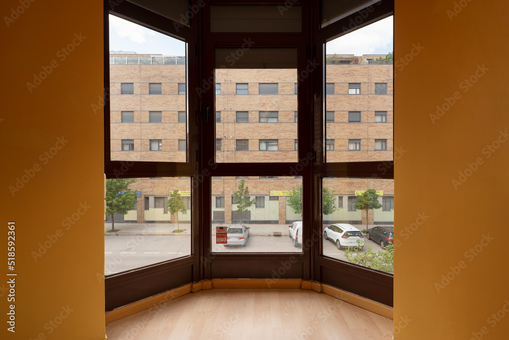 Window of a house in the corner of a room with black aluminum windows ...