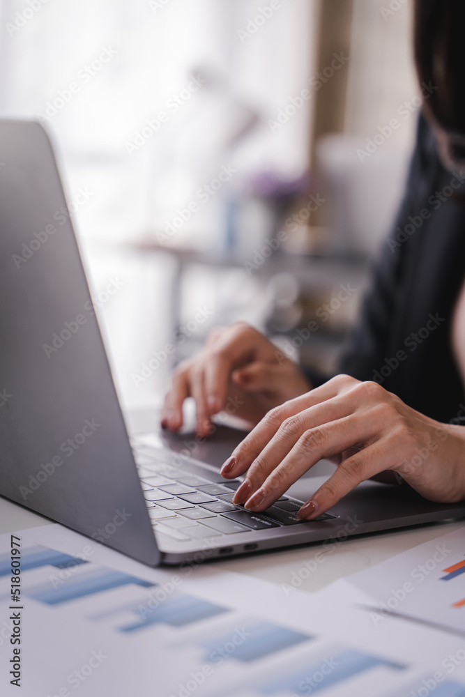 office girl's hands typing input data. Stock Photo | Adobe Stock