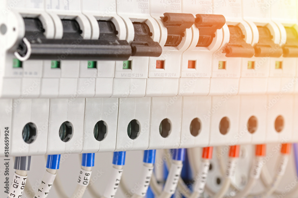 Automatic current switches installed in the electrical panel to protect ...