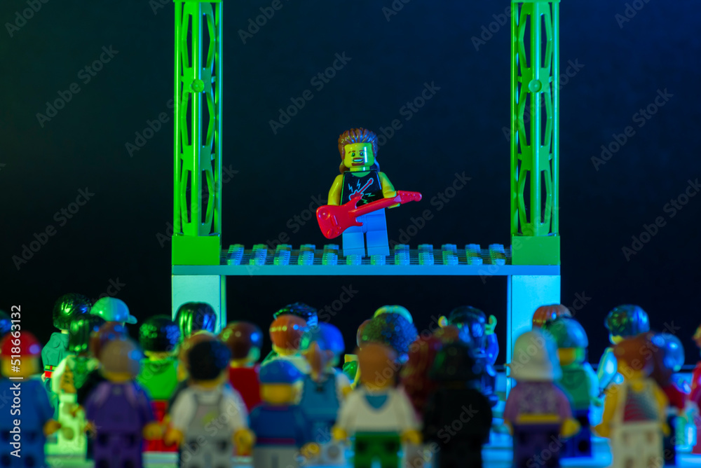Lego rock star minifigure playing guitar and performing a solo concert ...