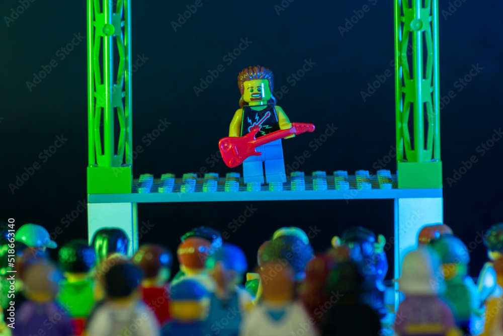 Lego rock star minifigure playing guitar and performing a solo concert ...
