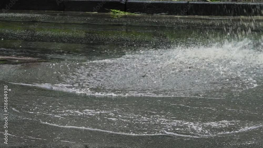 Car Drives Into A Puddle Of Water Splashing Around. Slow Motion. The ...
