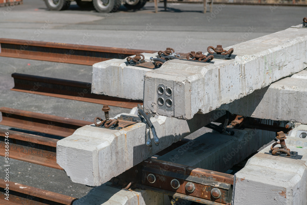 Railway infrastructures: stack of concrete railway sleepers, for ...