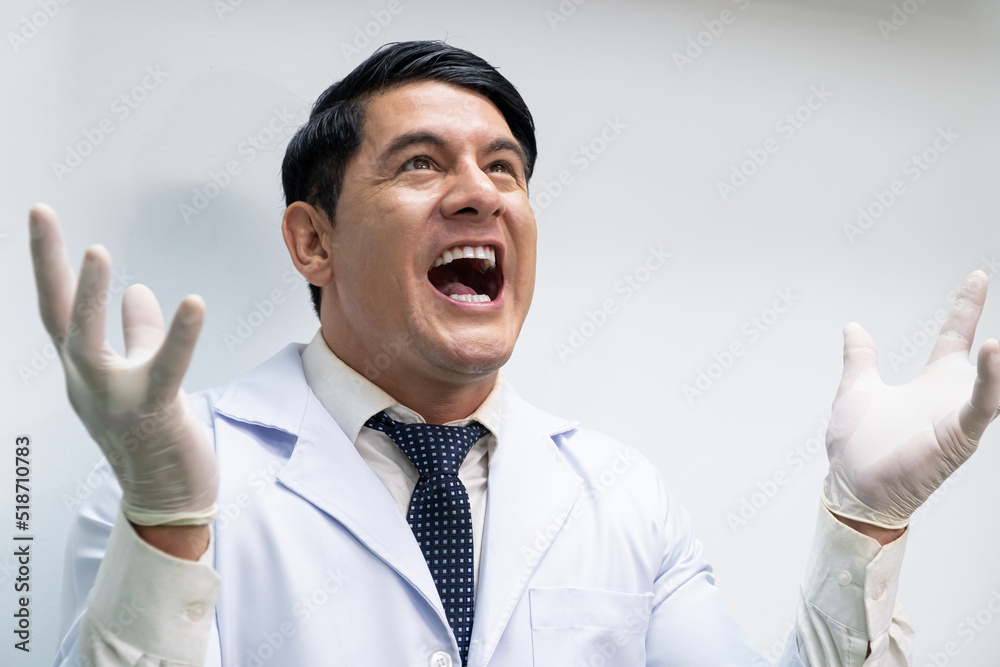Portrait shot of male doctor or Scientist who wearing white lab coat ...