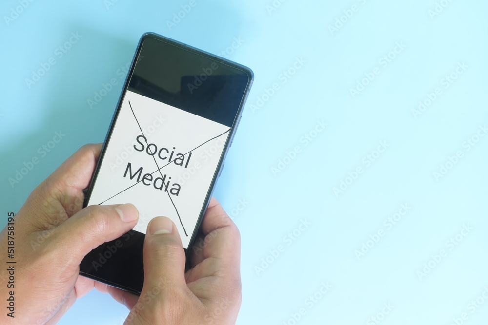 Social media and digital detox, break or pause concept. Hand holding a ...