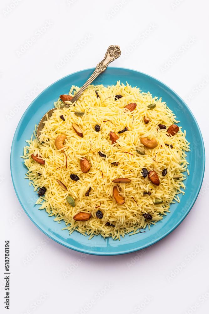 Kashmiri sweet modur pulao made of rice cooked with sugar, water ...