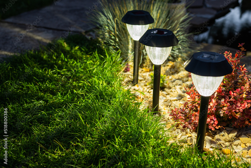Solar powered flashlights. garden lighting Stock Photo | Adobe Stock