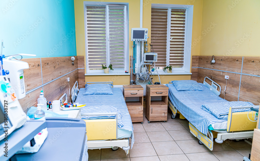 Empty modern hospital ward with comfortable bed. Healthcare treatment ...
