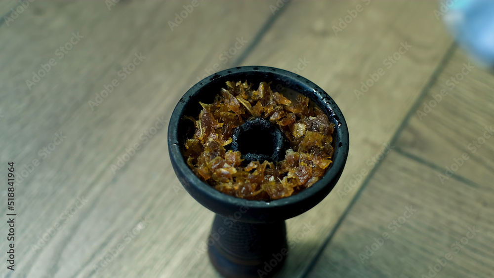 Hookah hot coals for smoking shisha on a bowl with tobacco. Media ...