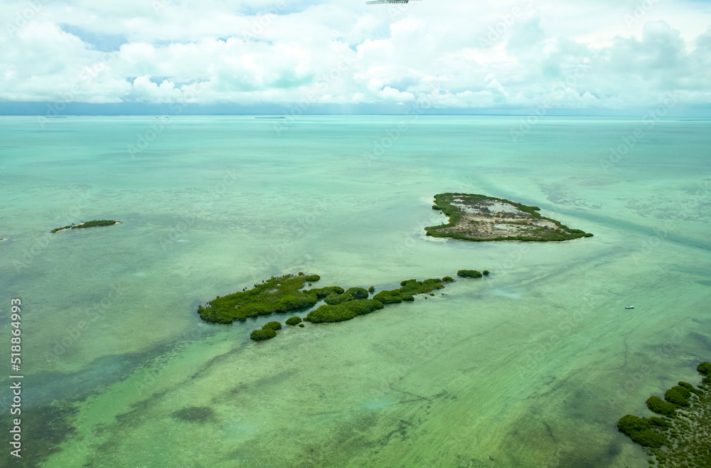 Flying over the Landscape Caribbean in Belize Stock Photo | Adobe Stock
