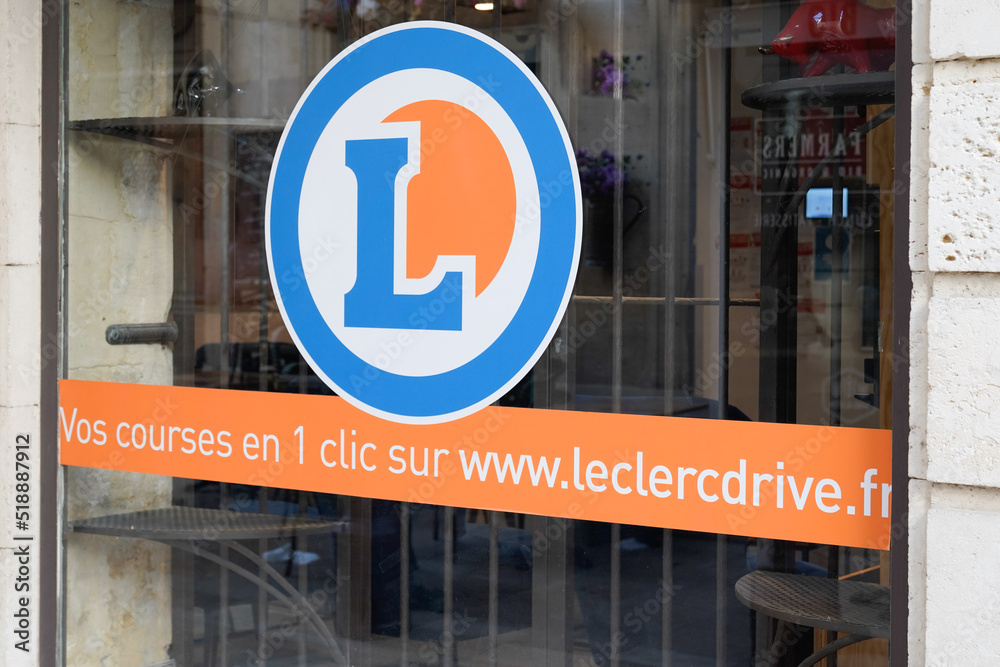 E.leclerc drive text logo and round brand sign on windows facade of ...